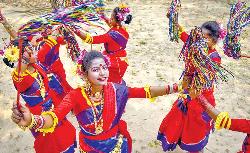 Santal women welcome the Spring, the king of all seasons