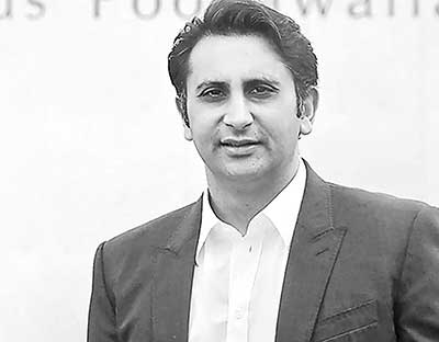 Poonawalla woos Musk to invest in making Tesla cars in India